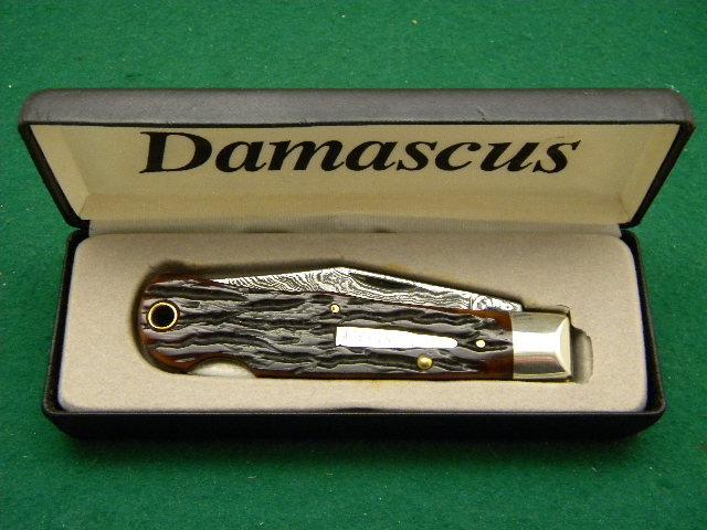 Remington UMC USA 1999 Genuine Bone R1303 Damascus Silver Bullet ...
