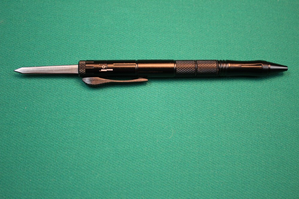 Novelty ballpoint pen with OTF locking blade