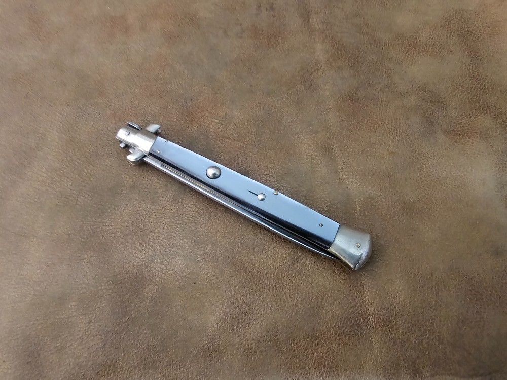 13" transitional stiletto black pearlex switchblade