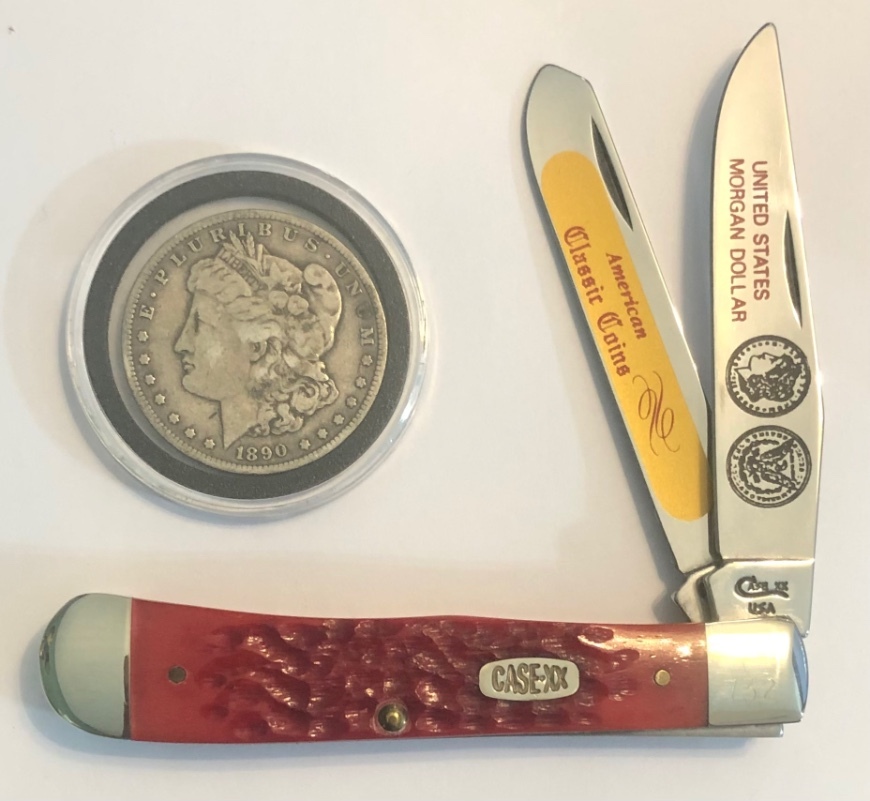 New in display Case Trapper and 1890 Silver Morgan Dollar