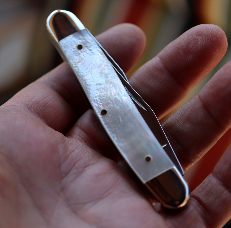 Unused top end Case silver script pearl muskrat. 2002 production but ...