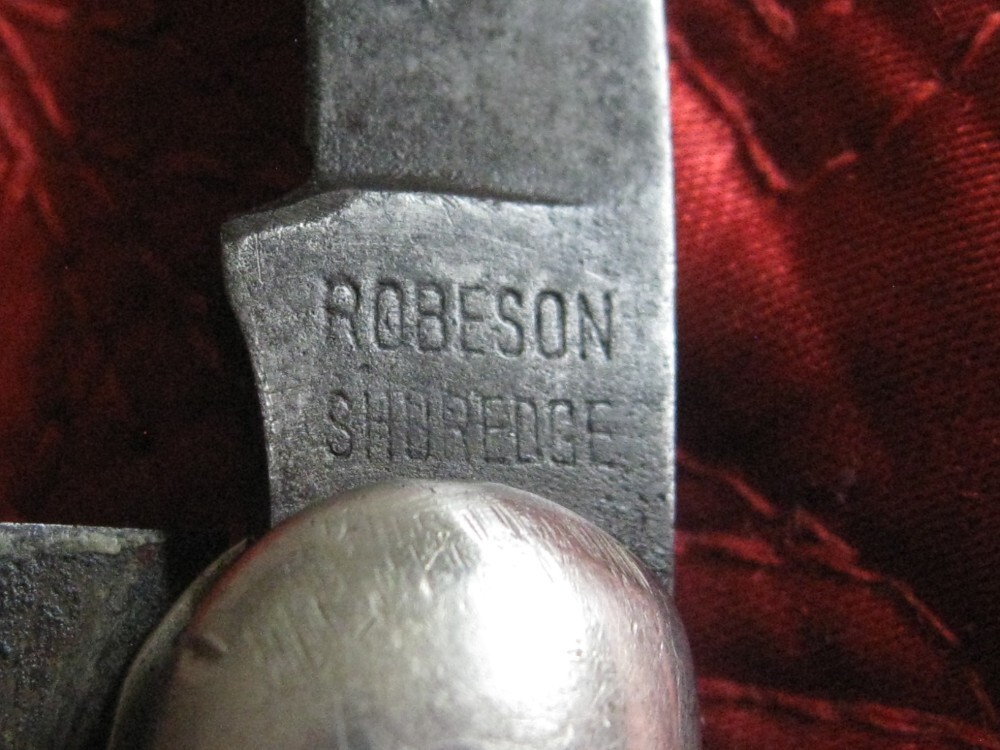 ROBESON 3 blade stock knife w/rough black scales pattern number633884