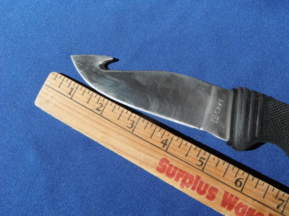 CRKT Wind River 2001 Fixed Blade Knife w/gut hook and leather sheath.
