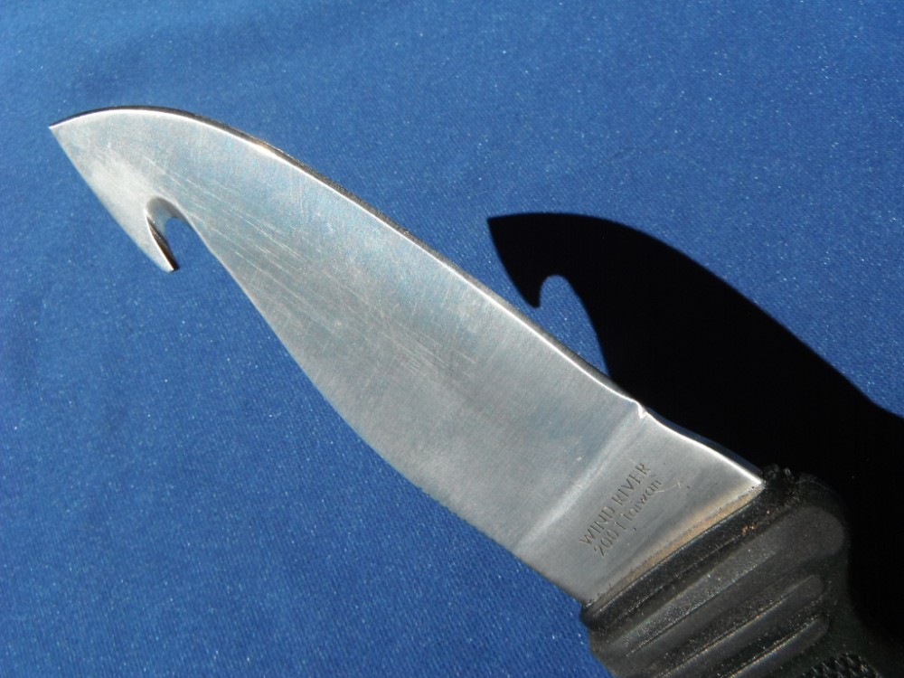 CRKT Wind River 2001 Fixed Blade Knife w/gut hook and leather sheath.