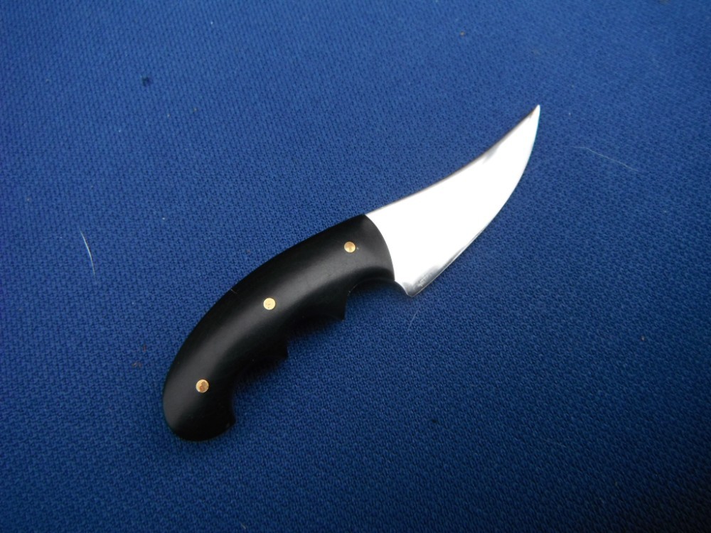 Custom handmade mini-fixed blade by Walter Stockdale.