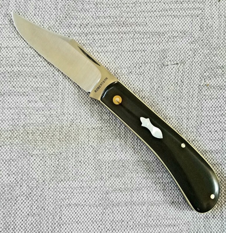 Tim Robertson Shadow Trapper..4" closed..Cpm154..Black Linen micarta ...