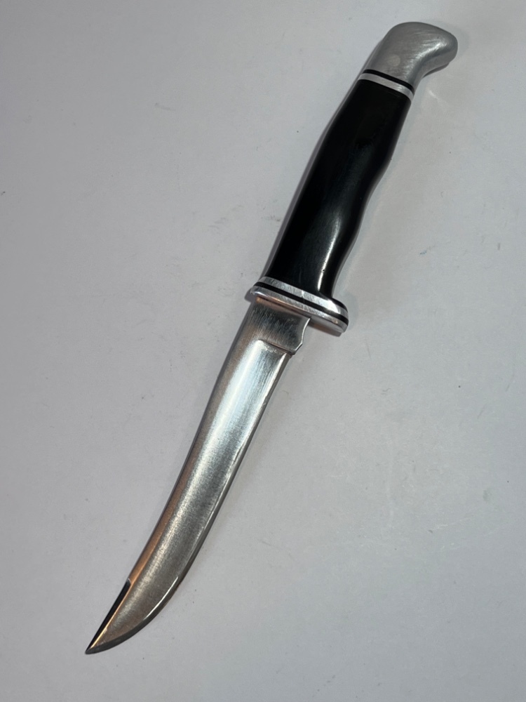 Buck 105, Inverted, 3 line stamp. 1972-1973. Used with sheath