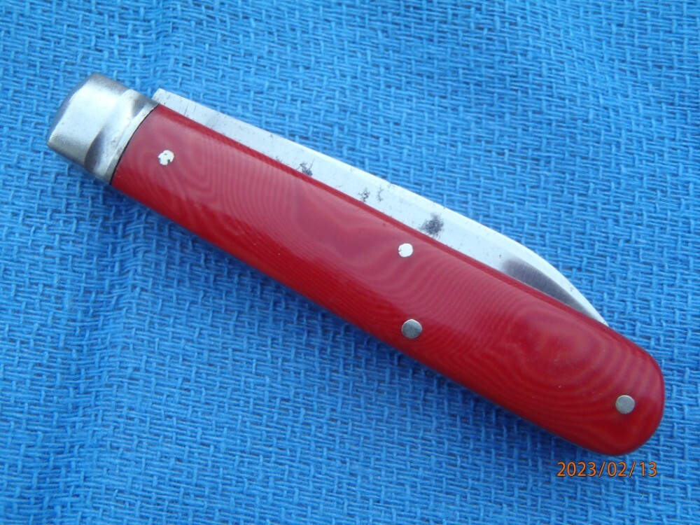 Utica (arch) Cutlery Co Utica NY Red Swirl Barehead Jack