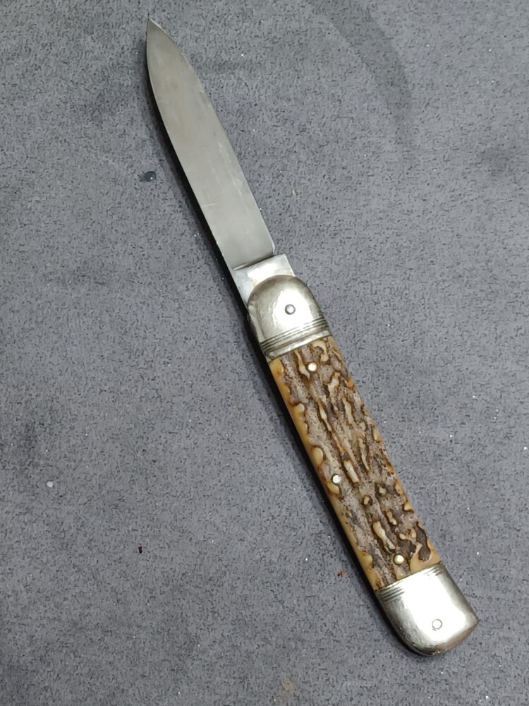 8" Vintage Hubertus Lever lock knife.