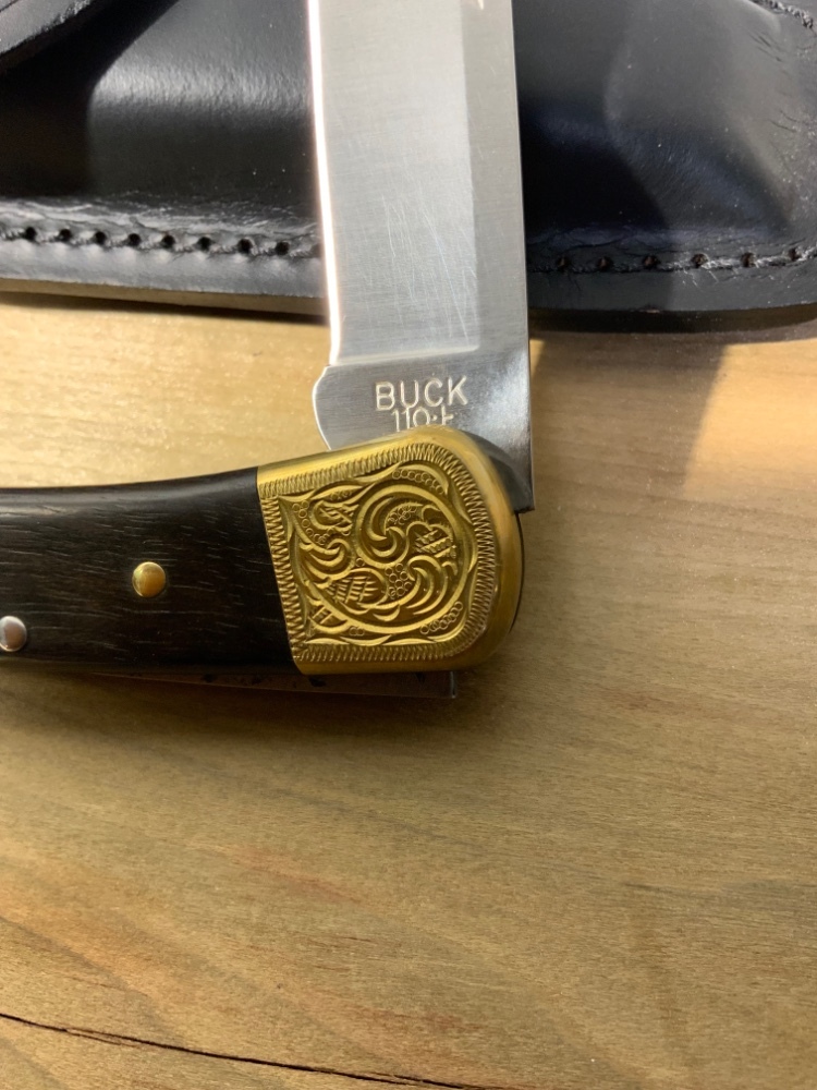 Buck 110 with engraved bolsters & original leather sheath 2020 tang stamp