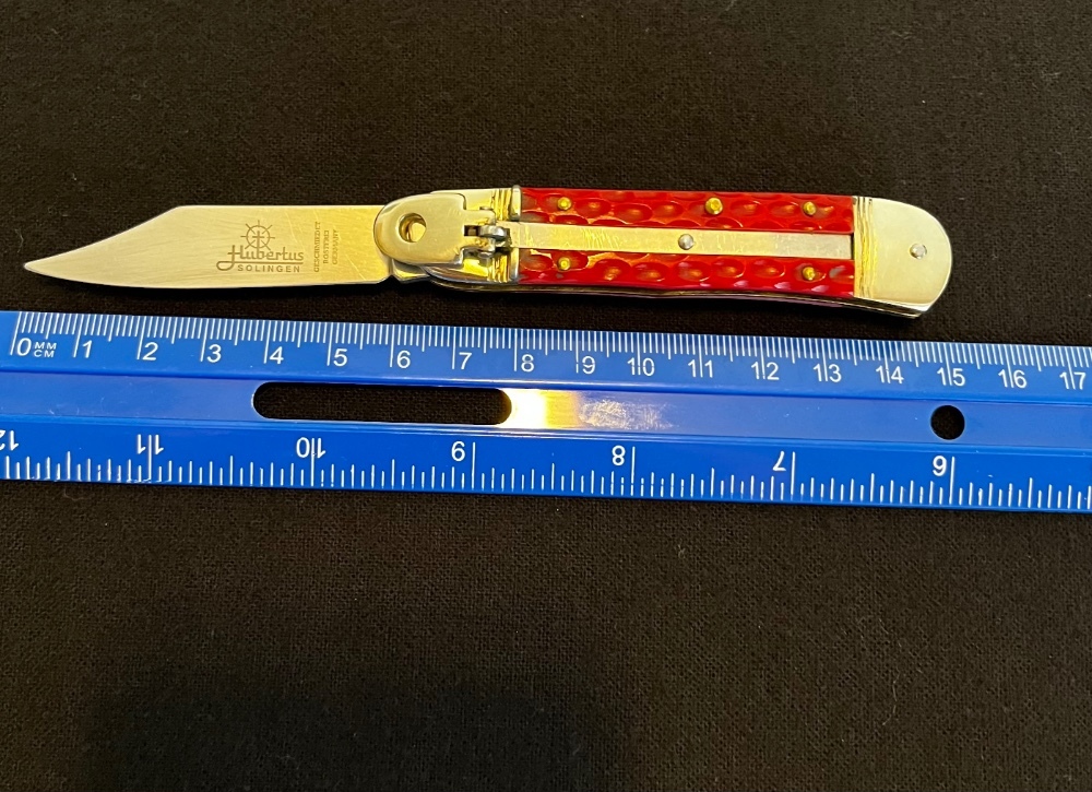 Hubertus Jigged Strawberry Red Bone Springer Lever Lock Automatic Knife