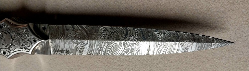 Double Dagger Fighting Knife with Damascus Blades.