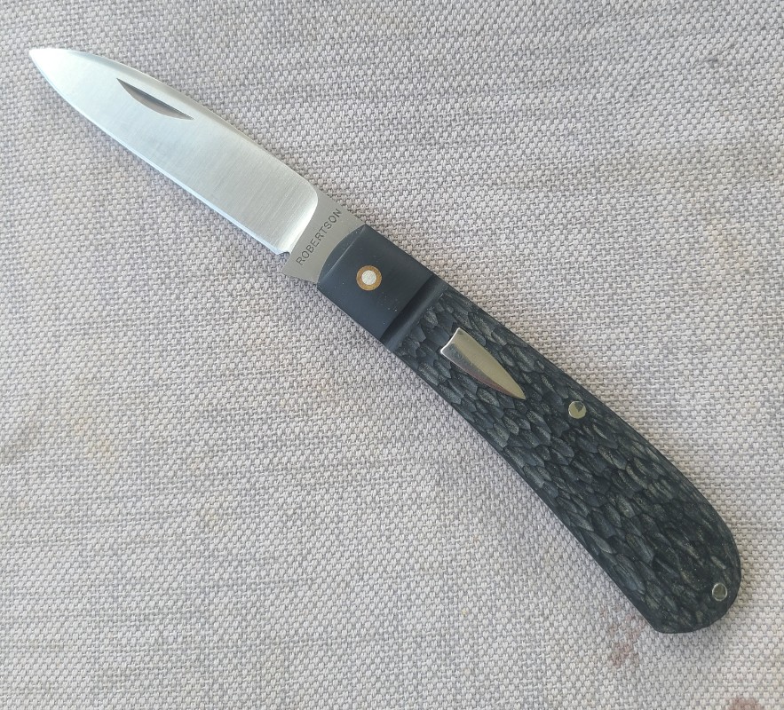Tim Robertson Full Size Zulu...jigged paper micarta scales.. fluted ...