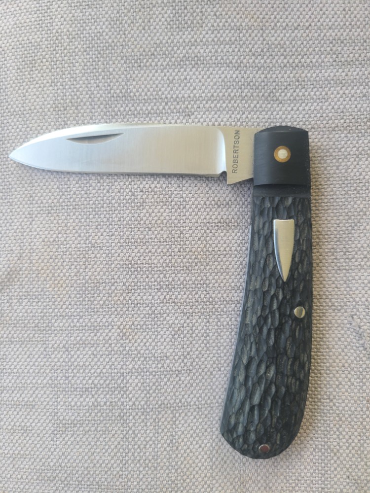 Tim Robertson Full Size Zulu...jigged paper micarta scales.. fluted ...