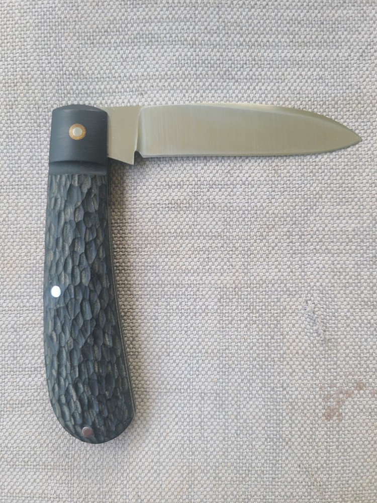 Tim Robertson Full Size Zulu...jigged paper micarta scales.. fluted ...