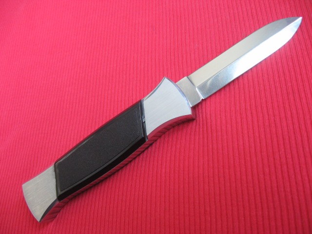 Older Italian Front Opener BLACK FINGER 777 OTF Switchblade Knife