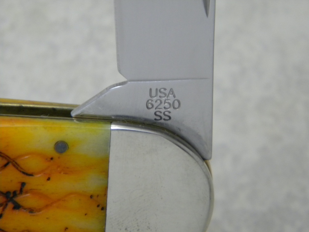 Case XX USA 2003 Orange Barbed Wire Bone 6250 Elephant Toe Knife