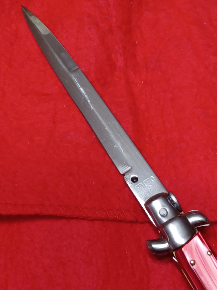 11" Vintage Stiletto Italy red acrylic.