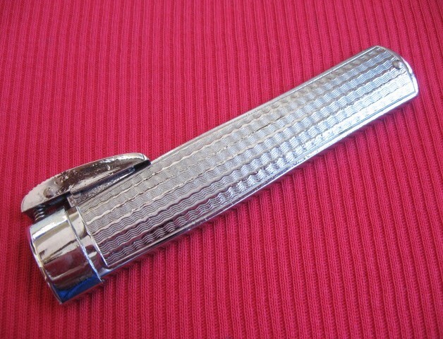 Older Chrome Plated Gravity Machined Handle OTF Knife