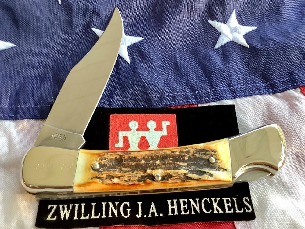 J A Henckels Large 5" Folding Hunter with Super Stag Handles in display ...