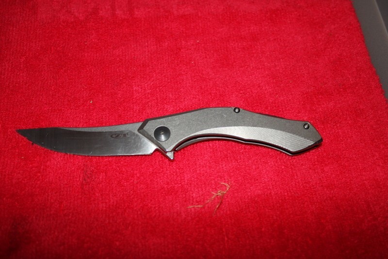 Zero Tolerance 0460TI in box. Used