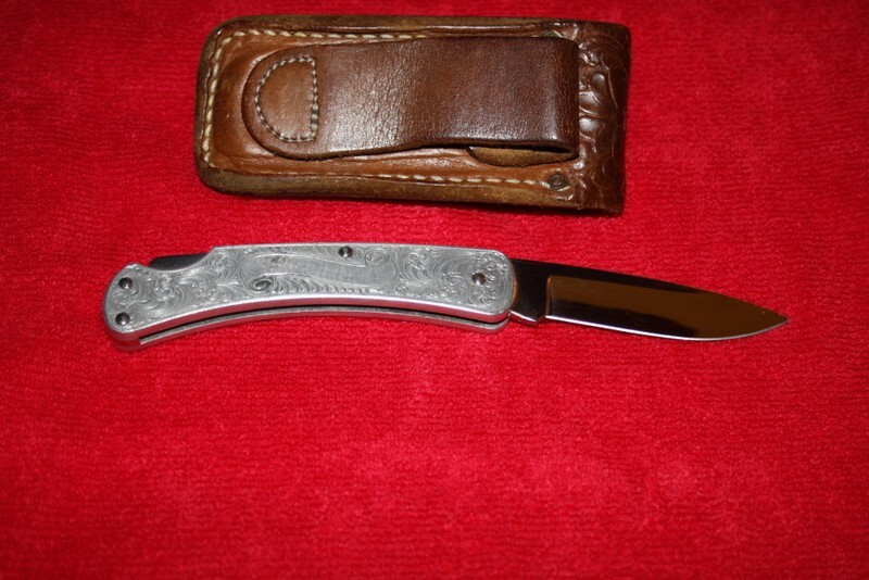 BUCK 510 FOLDING KNIFE WITH LEATHER SHEATH