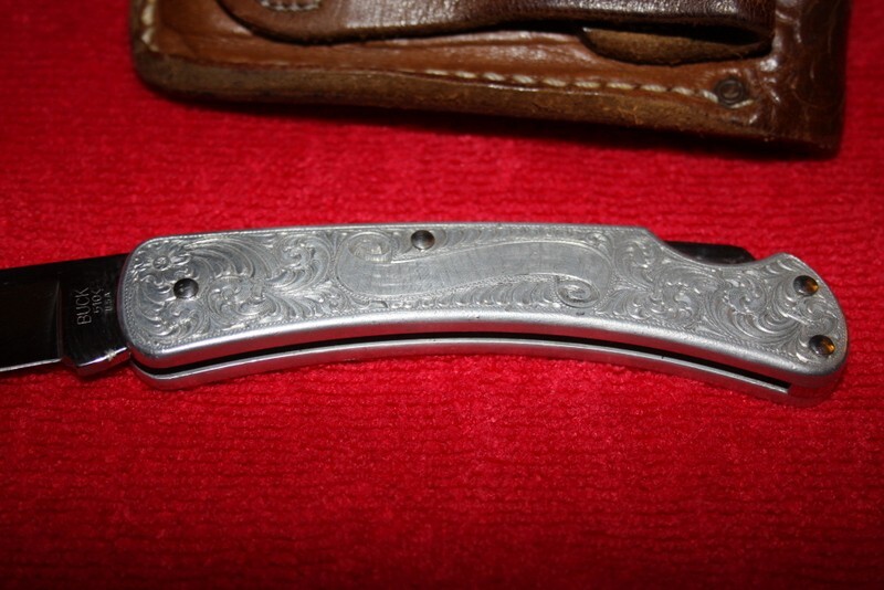 BUCK 510 FOLDING KNIFE WITH LEATHER SHEATH