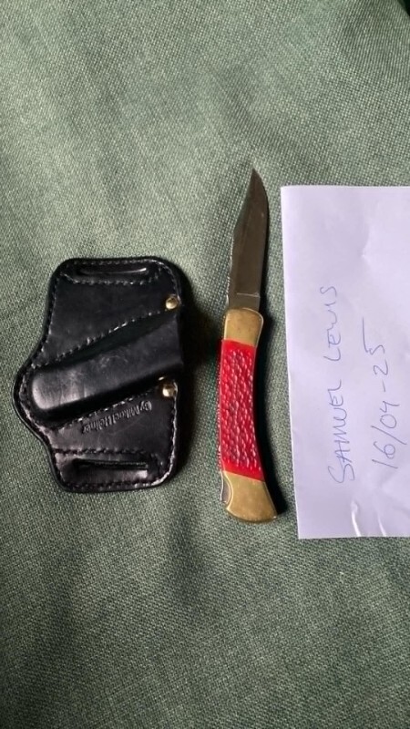 Buck 110 auto with file work and custom sheet