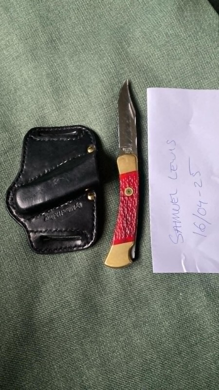 Buck 110 auto with file work and custom sheet