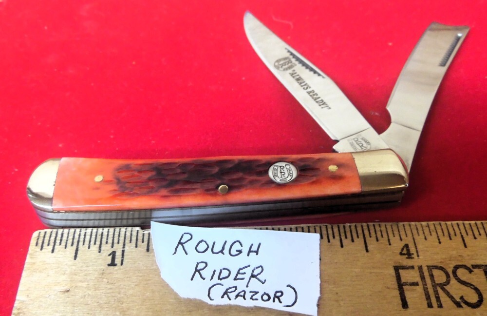 NEW TRAPPER RAZOR RED BONE ROUGH RIDER VERY NICE STAINLESS IMPORT